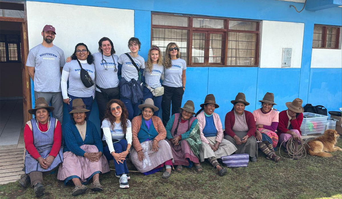 Nurse, coworkers care for a community a continent away